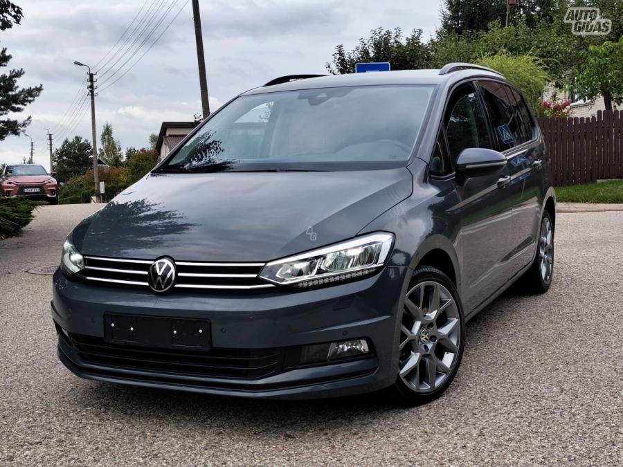 Grey Volkswagen Touran 2023 in Anyksciai, with an engine capacity of 2.00 L and mileage of 310 thousand km for 13250 €, photo 3 on AUTOMOTO.COM.LV