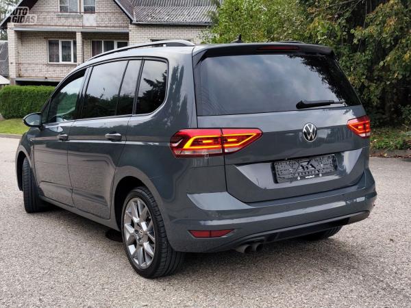 Grey Volkswagen Touran 2023 in Anyksciai, with an engine capacity of 2.00 L and mileage of 310 thousand km for 13250 €, photo 4 on AUTOMOTO.COM.LV