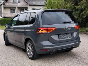 Grey Volkswagen Touran 2023 in Anyksciai, with an engine capacity of 2.00 L and mileage of 310 thousand km for 13250 €, photo 4 on AUTOMOTO.COM.LV