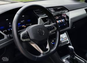 Grey Volkswagen Touran 2023 in Anyksciai, with an engine capacity of 2.00 L and mileage of 310 thousand km for 13250 €, photo 11 on AUTOMOTO.COM.LV