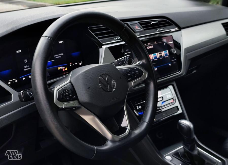 Grey Volkswagen Touran 2023 in Anyksciai, with an engine capacity of 2.00 L and mileage of 310 thousand km for 13250 €, photo 11 on AUTOMOTO.COM.LV