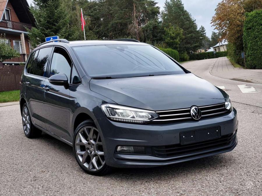 Grey Volkswagen Touran 2023 in Anyksciai, with an engine capacity of 2.00 L and mileage of 310 thousand km for 13250 €, photo 1 on AUTOMOTO.COM.LV