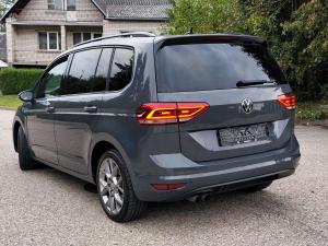 Grey Volkswagen Touran 2023 in Anyksciai, with an engine capacity of 2.00 L and mileage of 310 thousand km for 13250 €, photo 4 on AUTOMOTO.COM.LV