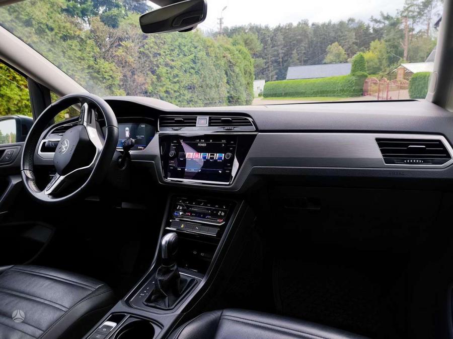 Grey Volkswagen Touran 2023 in Anyksciai, with an engine capacity of 2.00 L and mileage of 310 thousand km for 13250 €, photo 7 on AUTOMOTO.COM.LV