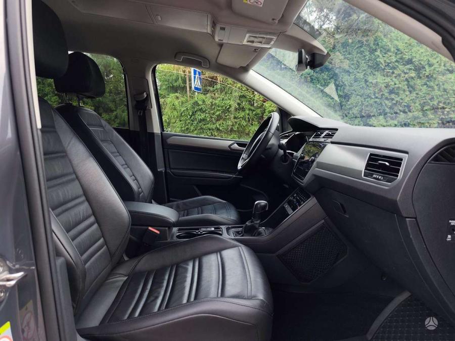 Grey Volkswagen Touran 2023 in Anyksciai, with an engine capacity of 2.00 L and mileage of 310 thousand km for 13250 €, photo 8 on AUTOMOTO.COM.LV