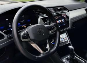 Grey Volkswagen Touran 2023 in Anyksciai, with an engine capacity of 2.00 L and mileage of 310 thousand km for 13250 €, photo 11 on AUTOMOTO.COM.LV