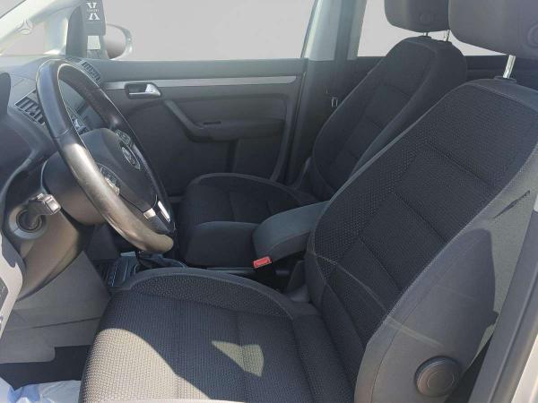 Grey Volkswagen Touran 2013 in Vilnius, with an engine capacity of 1.60 L and mileage of 231 thousand km for 5850 €, photo 7 on AUTOMOTO.COM.LV