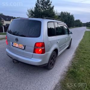 Grey Volkswagen Touran 2006 in Daugavpils, with an engine capacity of 2.00 L and mileage of 335 thousand km for 1050 €, photo 4 on AUTOMOTO.COM.LV