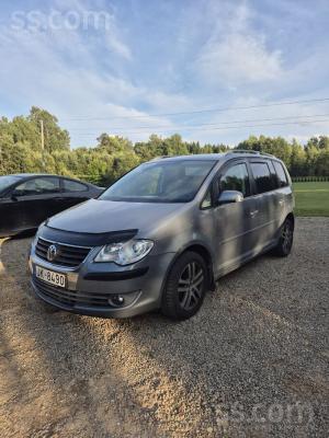 Grey Volkswagen Touran 2007 in Cesis, with an engine capacity of 1.90 L and mileage of 309 thousand km for 1550 €, photo  on AUTOMOTO.COM.LV