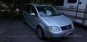 Grey Volkswagen Touran 2003 in Tallinn, with an engine capacity of 2.00 L and mileage of 394 thousand km for 900 €, photo  on AUTOMOTO.COM.LV
