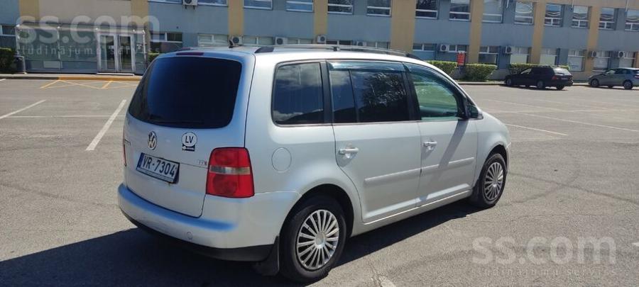 Pelēks Volkswagen Touran 2004 Rīga, ar dzinēja tilpumu 1.90 L un nobraukumu 307 tūkst. km par 970 €, foto 4 vietnē AUTOMOTO.COM.LV