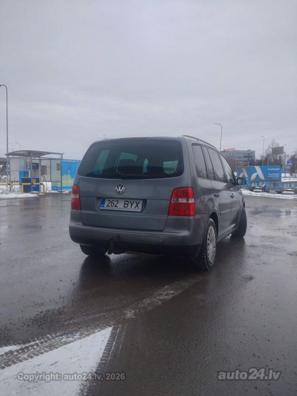 Pelēks Volkswagen Touran 2004 Tartu, ar dzinēja tilpumu 2.00 L un nobraukumu 360 tūkst. km par 1499 €, foto 4 vietnē AUTOMOTO.COM.LV