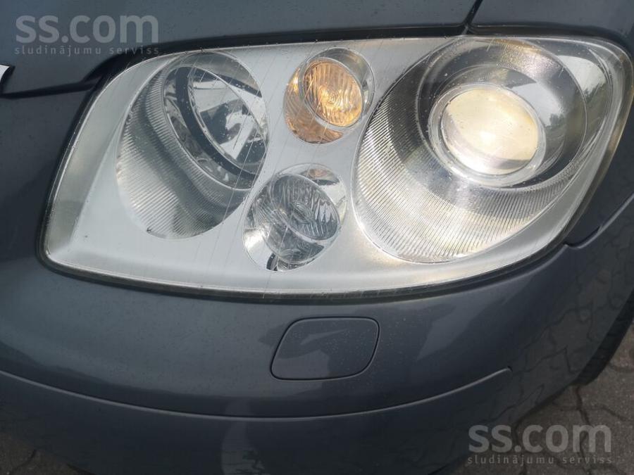 Grey Volkswagen Touran 2004 in Riga, with an engine capacity of 1.90 L and mileage of 0 thousand km for 2400 €, photo 14 on AUTOMOTO.COM.LV