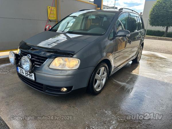 Grey Volkswagen Touran 2004 in Tallinn, with an engine capacity of 1.90 L and mileage of 356 thousand km for 1990 €, photo 3 on AUTOMOTO.COM.LV