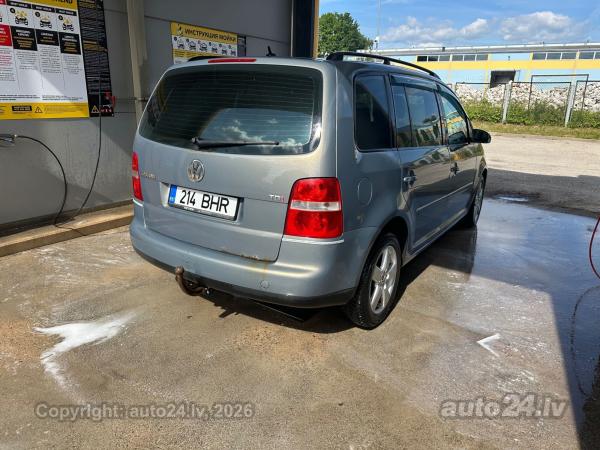 Grey Volkswagen Touran 2004 in Tallinn, with an engine capacity of 1.90 L and mileage of 356 thousand km for 1990 €, photo 8 on AUTOMOTO.COM.LV