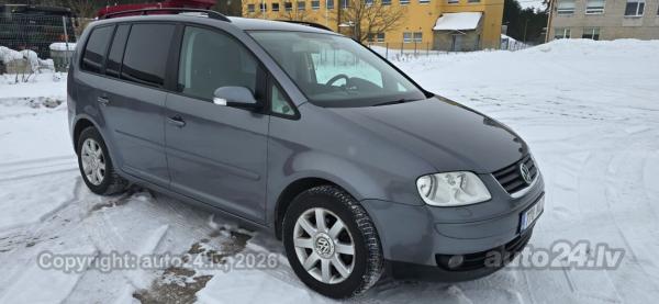 Grey Volkswagen Touran 2005 in Rakvere, with an engine capacity of 2.00 L and mileage of 253 thousand km for 3990 €, photo 1 on AUTOMOTO.COM.LV