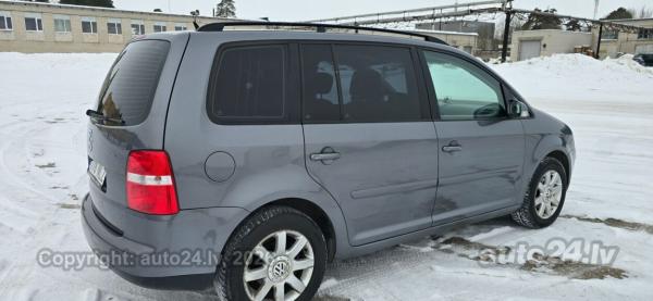 Grey Volkswagen Touran 2005 in Rakvere, with an engine capacity of 2.00 L and mileage of 253 thousand km for 3990 €, photo 2 on AUTOMOTO.COM.LV