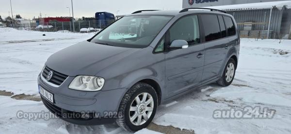 Grey Volkswagen Touran 2005 in Rakvere, with an engine capacity of 2.00 L and mileage of 253 thousand km for 3990 €, photo 4 on AUTOMOTO.COM.LV