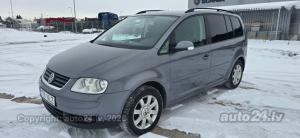 Grey Volkswagen Touran 2005 in Rakvere, with an engine capacity of 2.00 L and mileage of 253 thousand km for 3990 €, photo 4 on AUTOMOTO.COM.LV