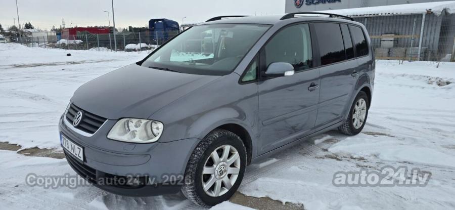 Grey Volkswagen Touran 2005 in Rakvere, with an engine capacity of 2.00 L and mileage of 253 thousand km for 3990 €, photo 4 on AUTOMOTO.COM.LV