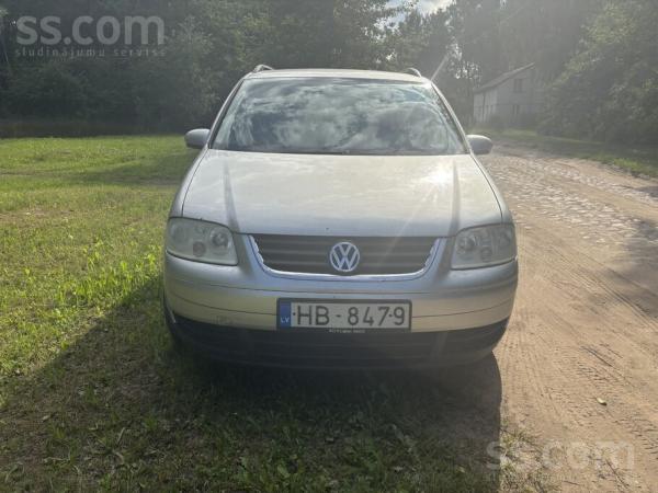 Grey Volkswagen Touran 2005 in Riga, with an engine capacity of 1.90 L and mileage of 331 thousand km for 2000 €, photo 2 on AUTOMOTO.COM.LV