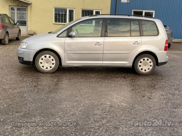 Pelēks Volkswagen Touran 2006 Tartu, ar dzinēja tilpumu 2.00 L un nobraukumu 429 tūkst. km par 1990 €, foto 3 vietnē AUTOMOTO.COM.LV