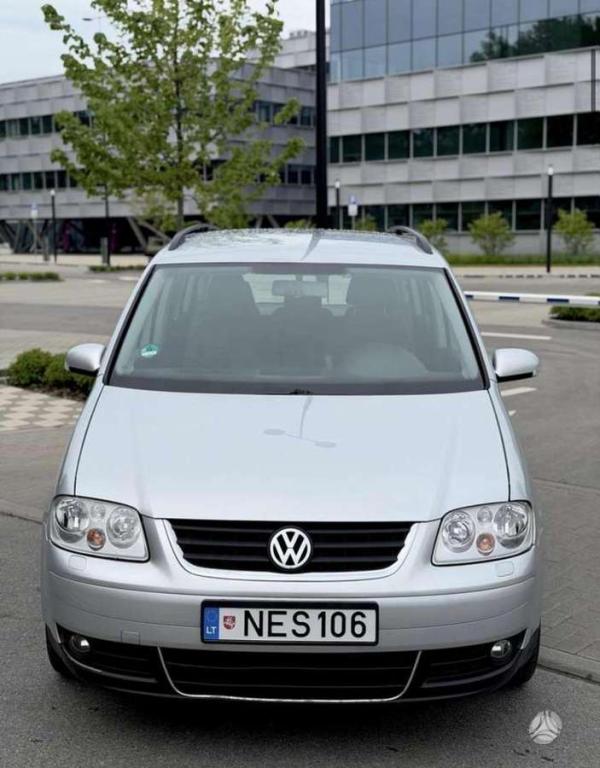 Grey Volkswagen Touran 2006 in Vilnius, with an engine capacity of 1.90 L and mileage of 295 thousand km for 2800 €, photo 3 on AUTOMOTO.COM.LV