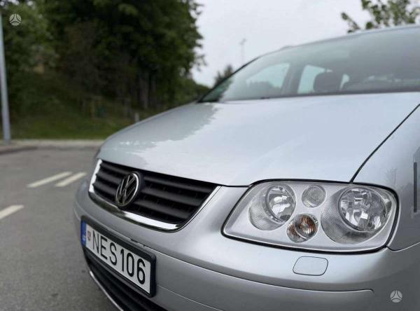 Grey Volkswagen Touran 2006 in Vilnius, with an engine capacity of 1.90 L and mileage of 295 thousand km for 2800 €, photo 8 on AUTOMOTO.COM.LV