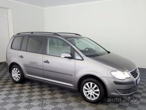 Grey Volkswagen Touran 2007 in Tallinn, with an engine capacity of 1.90 L and mileage of 307 thousand km for 2599 €, photo  on AUTOMOTO.COM.LV