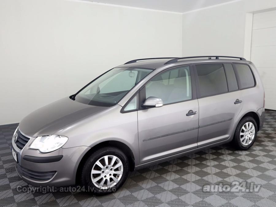 Grey Volkswagen Touran 2007 in Tallinn, with an engine capacity of 1.90 L and mileage of 307 thousand km for 2599 €, photo 3 on AUTOMOTO.COM.LV
