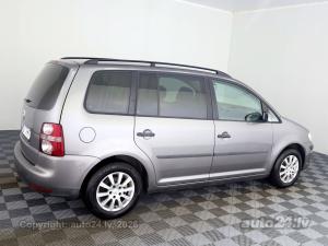 Grey Volkswagen Touran 2007 in Tallinn, with an engine capacity of 1.90 L and mileage of 307 thousand km for 2599 €, photo 4 on AUTOMOTO.COM.LV