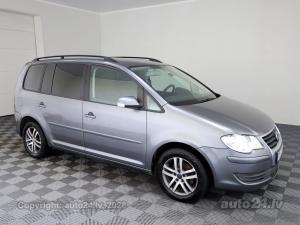Pelēks Volkswagen Touran 2007 Tallina, ar dzinēja tilpumu 1.90 L un nobraukumu 299 tūkst. km par 1999 €, foto  vietnē AUTOMOTO.COM.LV