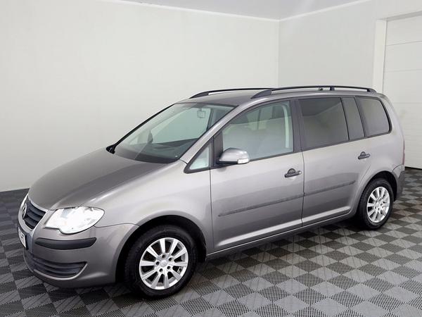 Grey Volkswagen Touran 2007 in Tallinn, with an engine capacity of 1.90 L and mileage of 307 thousand km for 2199 €, photo 2 on AUTOMOTO.COM.LV