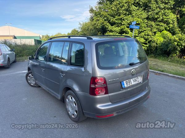 Grey Volkswagen Touran 2007 in Tallinn, with an engine capacity of 1.90 L and mileage of 259 thousand km for 1399 €, photo 2 on AUTOMOTO.COM.LV