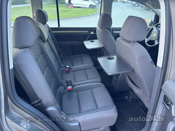 Grey Volkswagen Touran 2007 in Tallinn, with an engine capacity of 1.90 L and mileage of 259 thousand km for 1399 €, photo 6 on AUTOMOTO.COM.LV