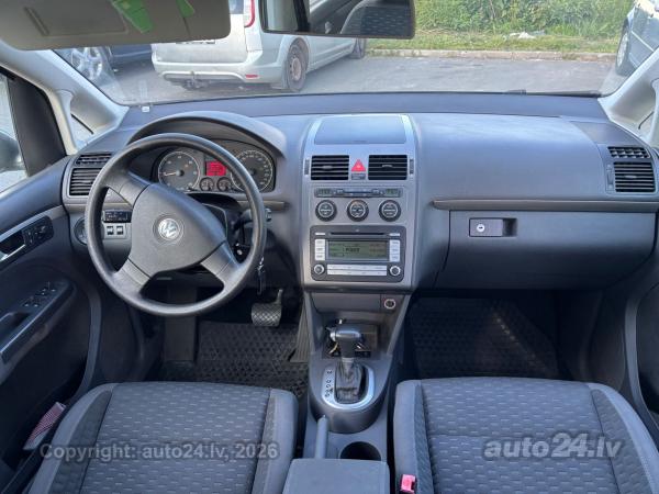 Grey Volkswagen Touran 2007 in Tallinn, with an engine capacity of 1.90 L and mileage of 259 thousand km for 1399 €, photo 7 on AUTOMOTO.COM.LV