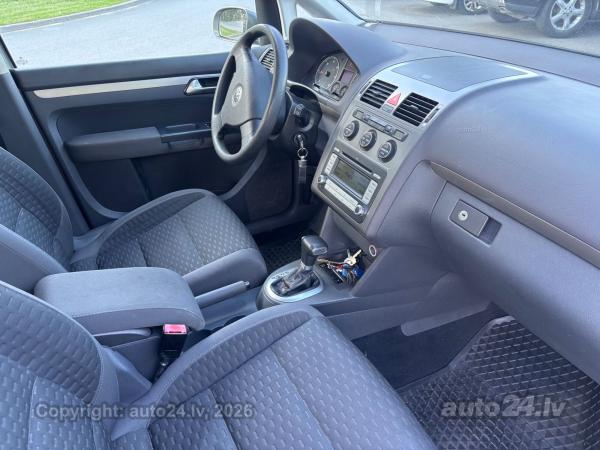Grey Volkswagen Touran 2007 in Tallinn, with an engine capacity of 1.90 L and mileage of 259 thousand km for 1399 €, photo 8 on AUTOMOTO.COM.LV