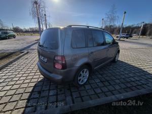 Grey Volkswagen Touran 2007 in Tartu, with an engine capacity of 1.90 L and mileage of 505 thousand km for 1999 €, photo 5 on AUTOMOTO.COM.LV