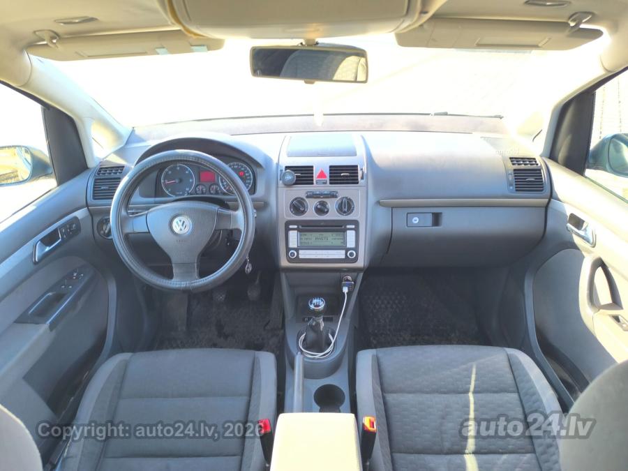 Grey Volkswagen Touran 2007 in Tartu, with an engine capacity of 1.90 L and mileage of 505 thousand km for 1999 €, photo 8 on AUTOMOTO.COM.LV