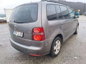 Grey Volkswagen Touran 2008 in Tallinn, with an engine capacity of 1.40 L and mileage of 225 thousand km for 4300 €, photo 6 on AUTOMOTO.COM.LV