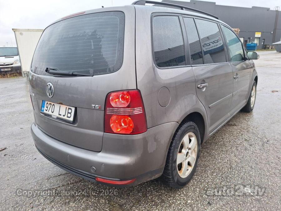 Grey Volkswagen Touran 2008 in Tallinn, with an engine capacity of 1.40 L and mileage of 225 thousand km for 4300 €, photo 6 on AUTOMOTO.COM.LV