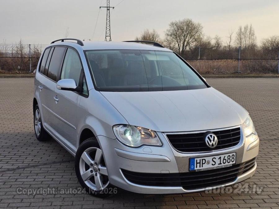 Grey Volkswagen Touran 2008 in Viljandi, with an engine capacity of 1.90 L and mileage of 225 thousand km for 5499 €, photo 7 on AUTOMOTO.COM.LV