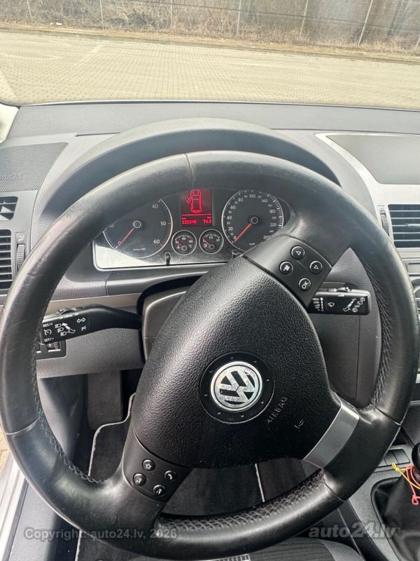 Grey Volkswagen Touran 2008 in Viljandi, with an engine capacity of 1.90 L and mileage of 225 thousand km for 5499 €, photo 11 on AUTOMOTO.COM.LV