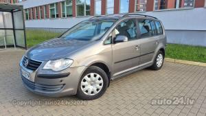 Grey Volkswagen Touran 2008 in Tartu, with an engine capacity of 1.90 L and mileage of 375 thousand km for 2499 €, photo  on AUTOMOTO.COM.LV