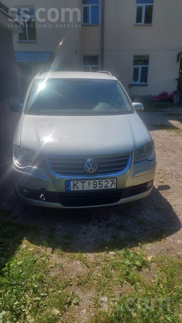 Grey Volkswagen Touran 2009 in Riga, with an engine capacity of 1.90 L and mileage of 0 thousand km for 500 €, photo 1 on AUTOMOTO.COM.LV