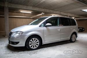 Grey Volkswagen Touran 2010 in Tallinn, with an engine capacity of 1.90 L and mileage of 357 thousand km for 5500 €, photo 7 on AUTOMOTO.COM.LV