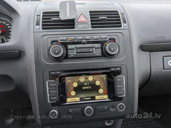 Grey Volkswagen Touran 2011 in Tartu, with an engine capacity of 2.00 L and mileage of 239 thousand km for 4550 €, photo 11 on AUTOMOTO.COM.LV