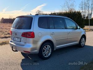 Grey Volkswagen Touran 2011 in Tallinn, with an engine capacity of 1.40 L and mileage of 208 thousand km for 5000 €, photo 4 on AUTOMOTO.COM.LV
