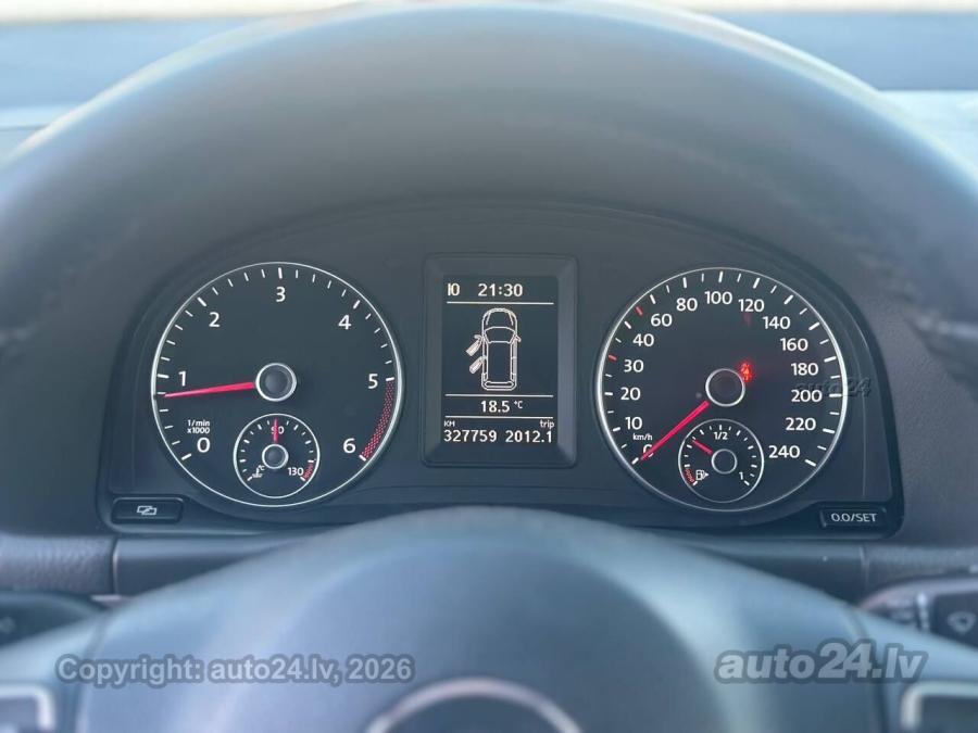 Pelēks Volkswagen Touran 2011 Tartu, ar dzinēja tilpumu 1.60 L un nobraukumu 328 tūkst. km par 3999 €, foto 23 vietnē AUTOMOTO.COM.LV
