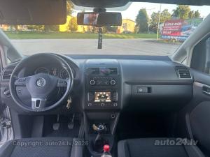 Pelēks Volkswagen Touran 2011 Tartu, ar dzinēja tilpumu 1.60 L un nobraukumu 328 tūkst. km par 3999 €, foto 30 vietnē AUTOMOTO.COM.LV